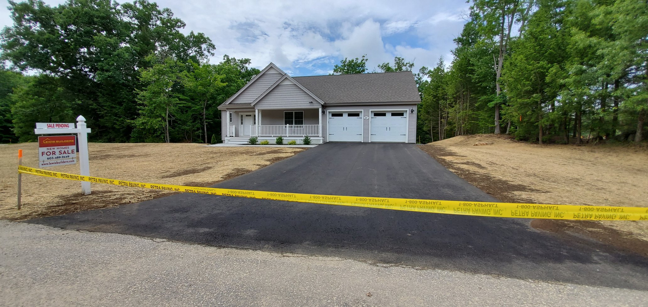 Why do Tire Scuffing and Indentations Appear on a New Asphalt Driveway